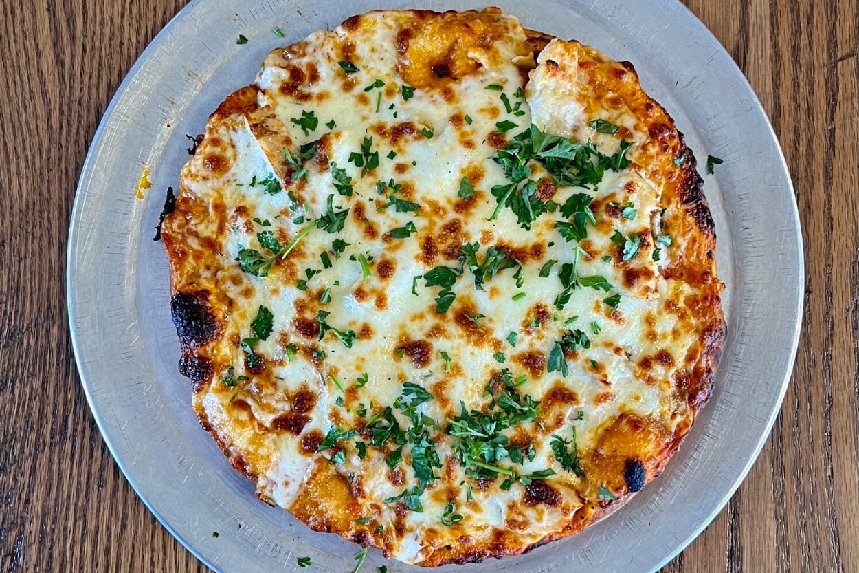 Indian Butter Chicken Pizza in Greenville | Move Upstate SC